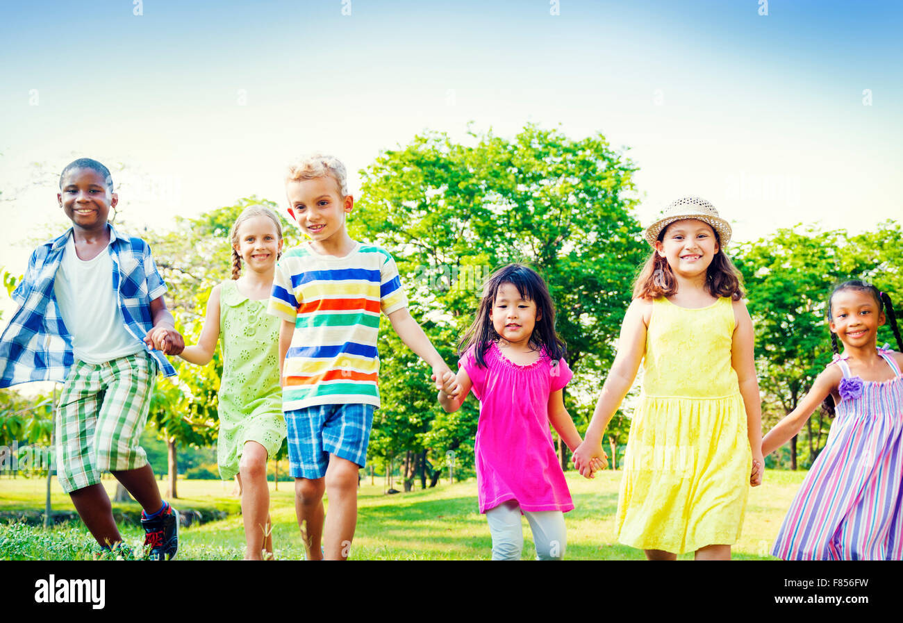 Children Kids Friendship Walking Happiness Concept Stock Photo - Alamy