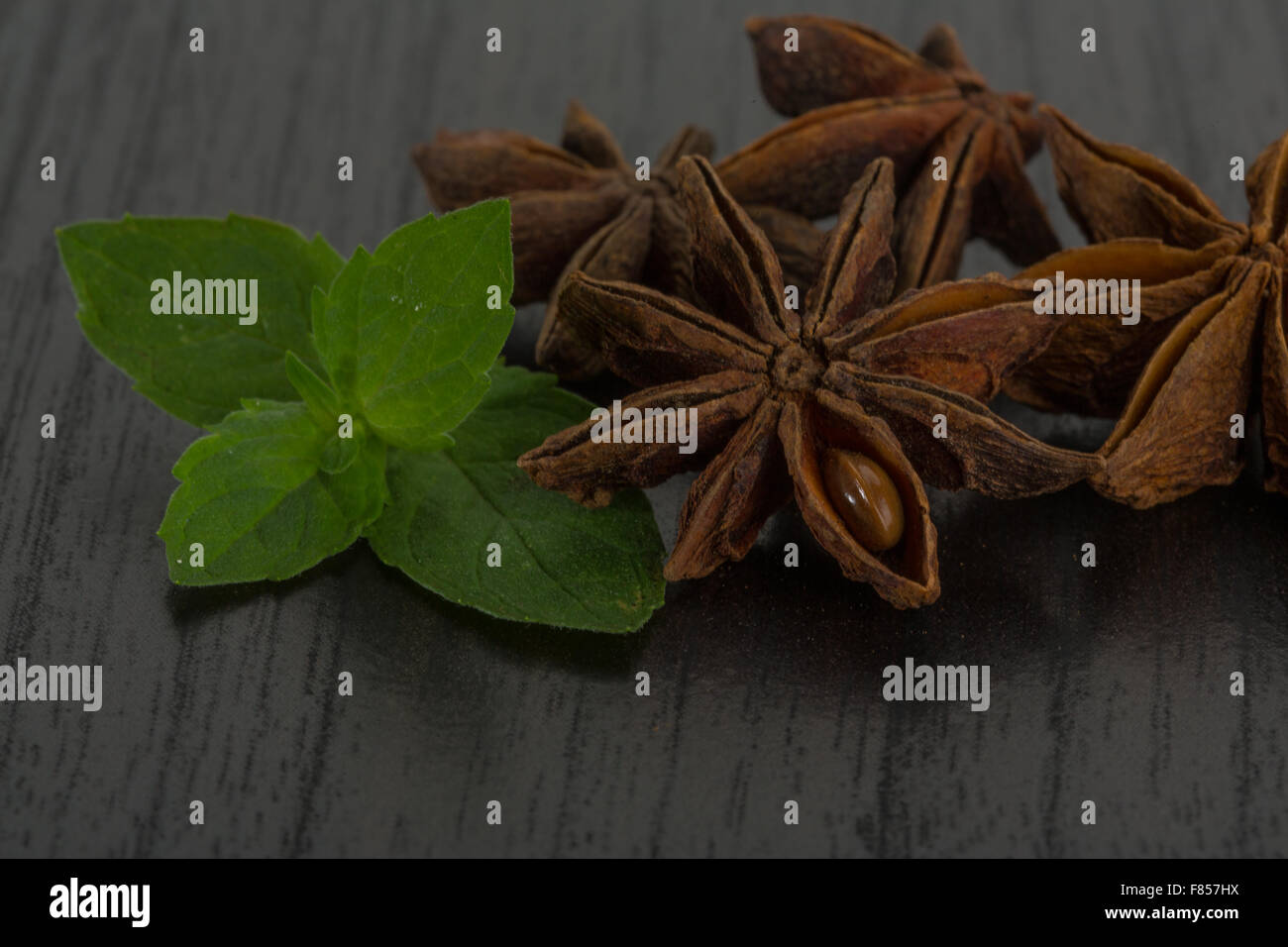 Star anise with mint leaves Stock Photo - Alamy
