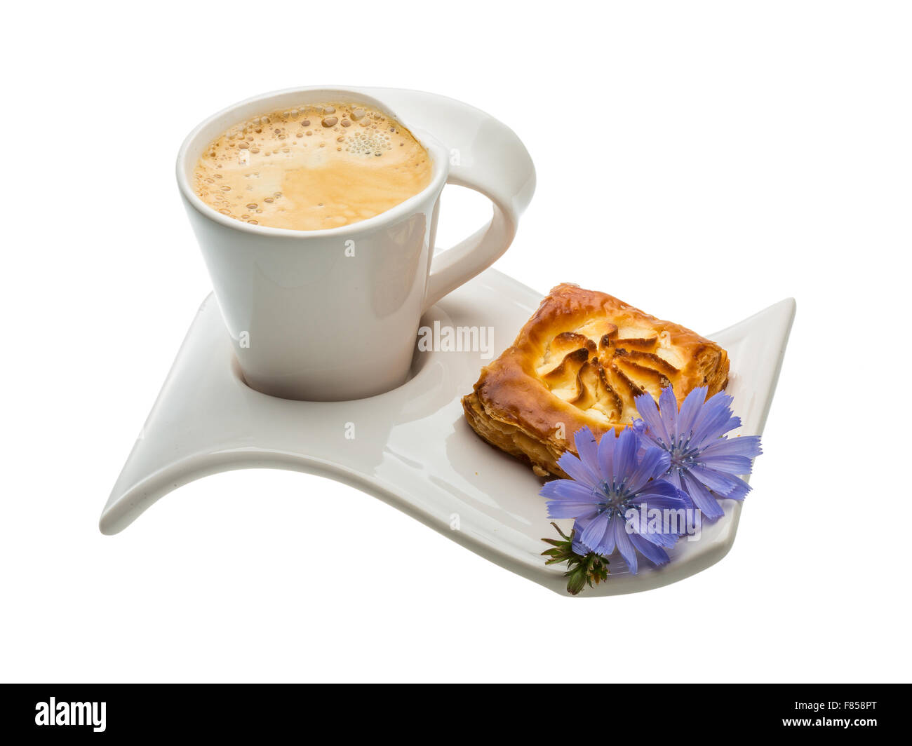 Coffee with pastry and blue flower Stock Photo - Alamy