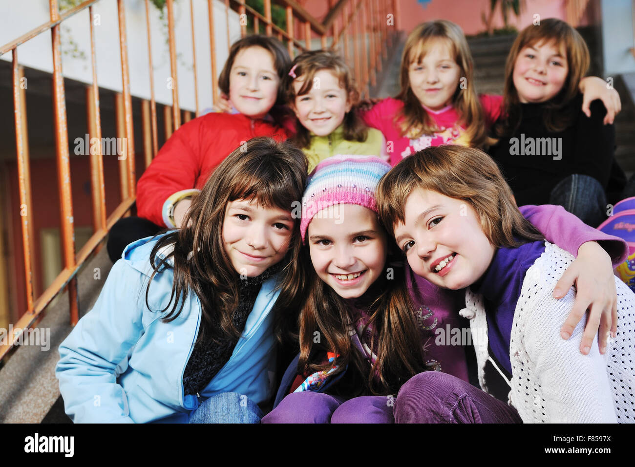happy school girls running outdoor at sunny autumn day Stock Photo - Alamy