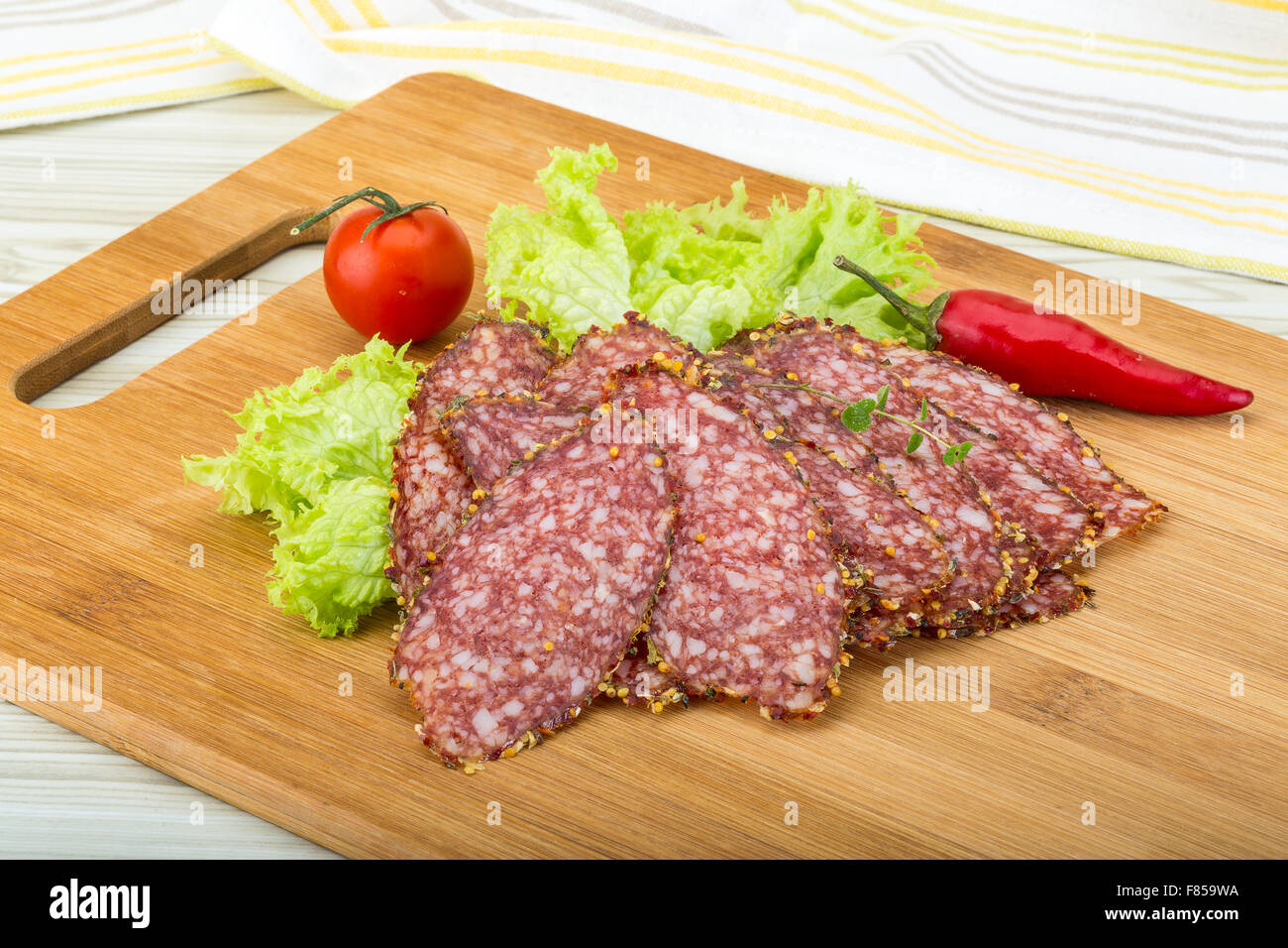 Sliced salami - with herbs and spices Stock Photo - Alamy