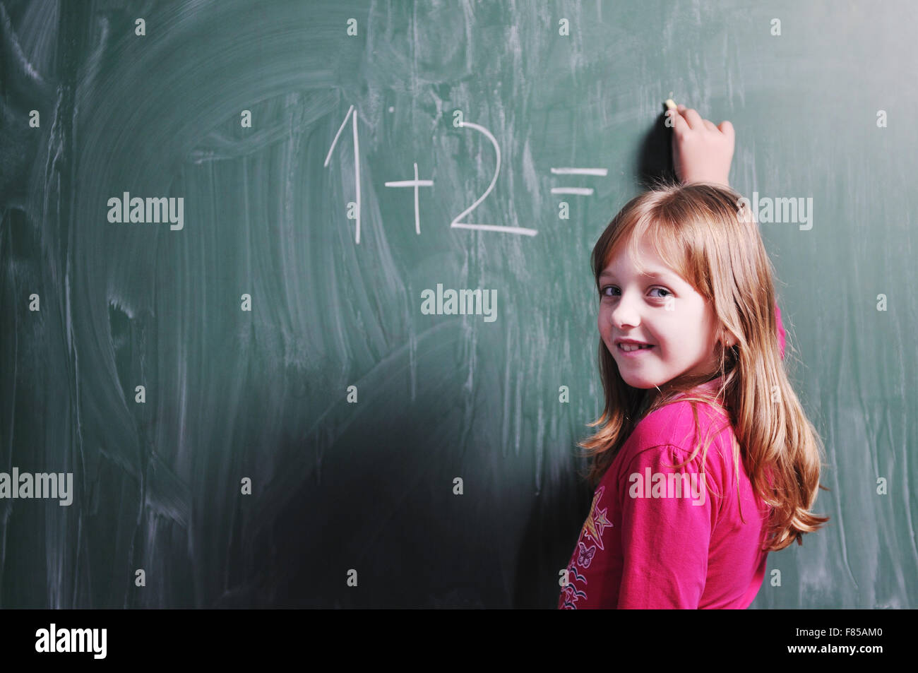 happy young school girl portrait on math class Stock Photo - Alamy