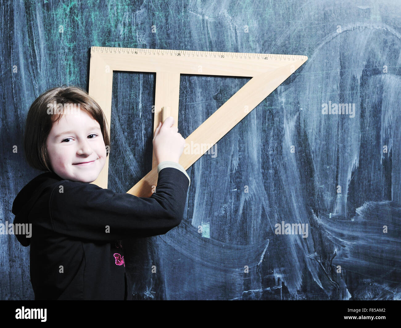 happy young school girl portrait on math class Stock Photo - Alamy