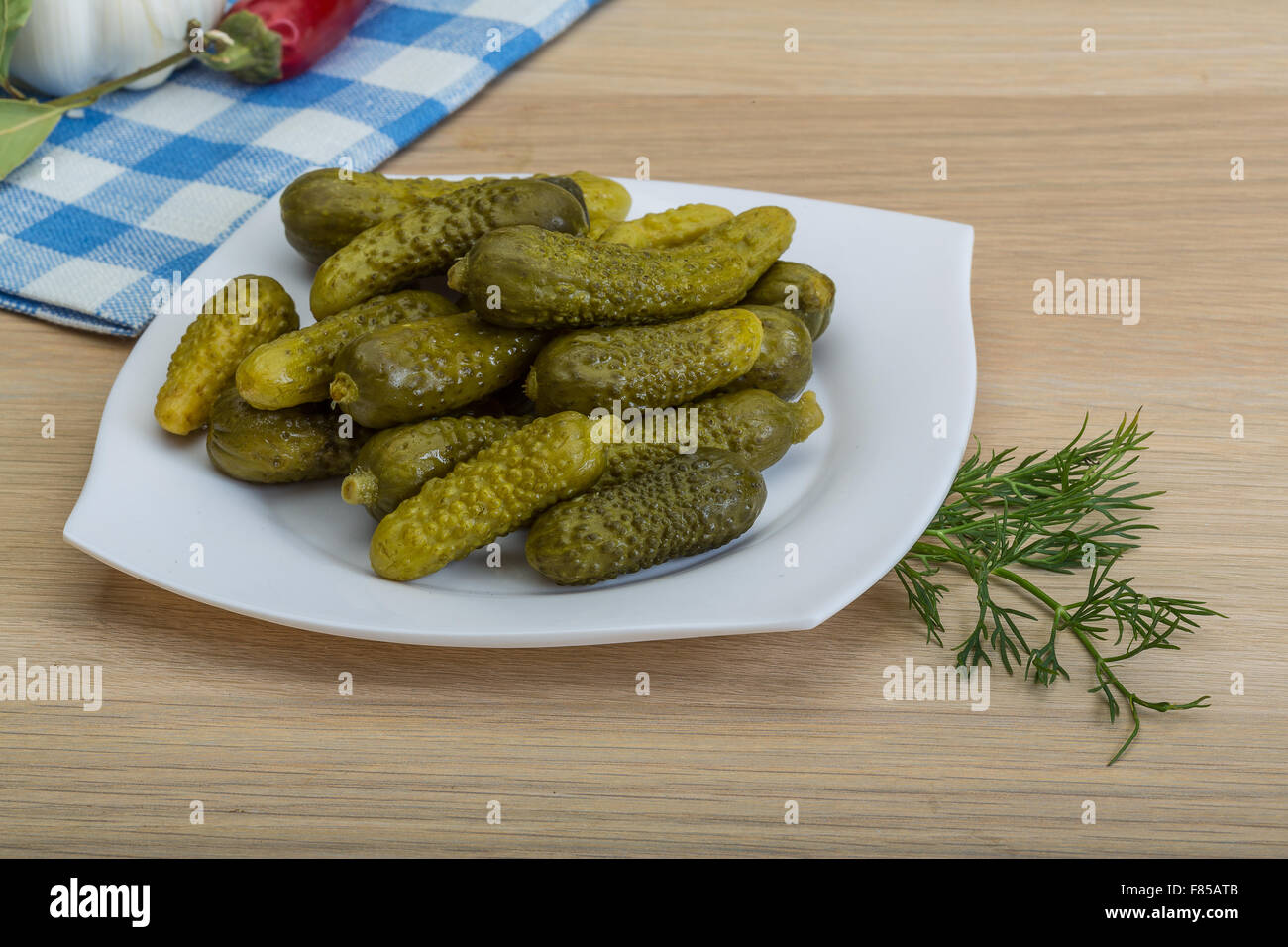 Pickled small cucumber with dill and spices Stock Photo - Alamy