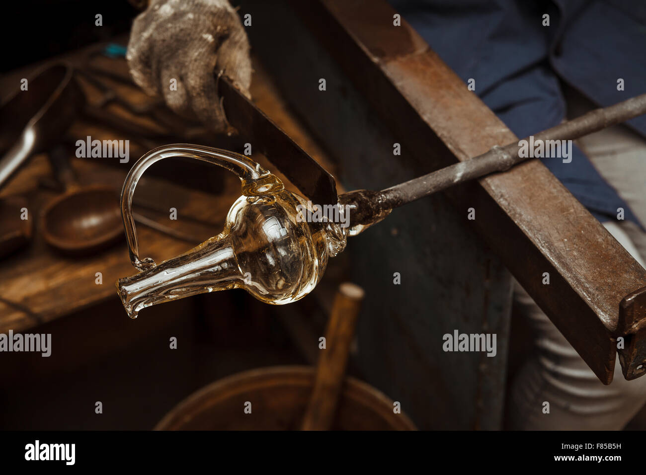 Glass Artist in her workshop making glassware Stock Photo - Alamy