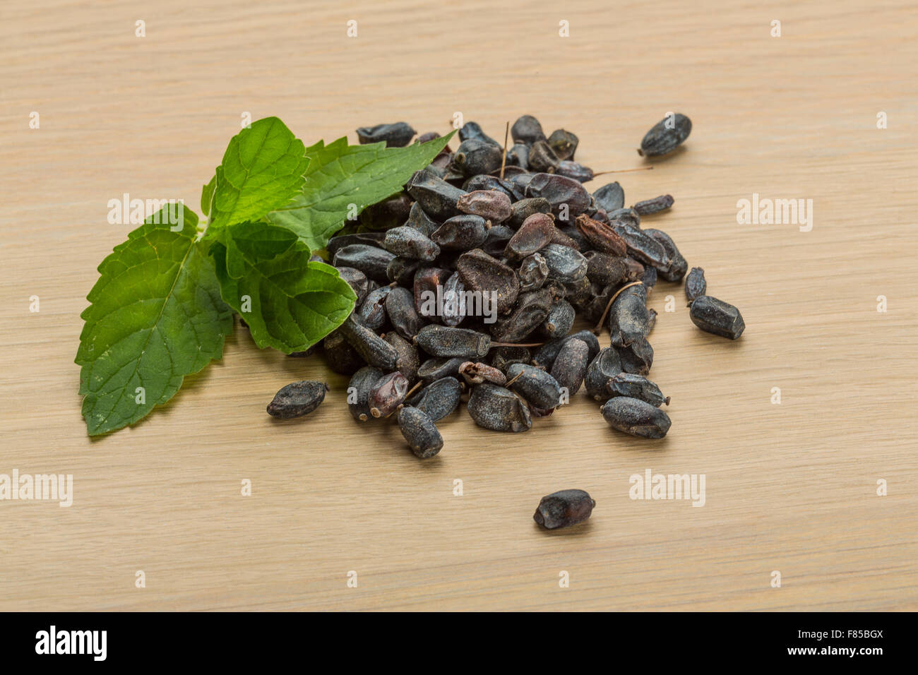 Dry blue berberis with mint Stock Photo - Alamy
