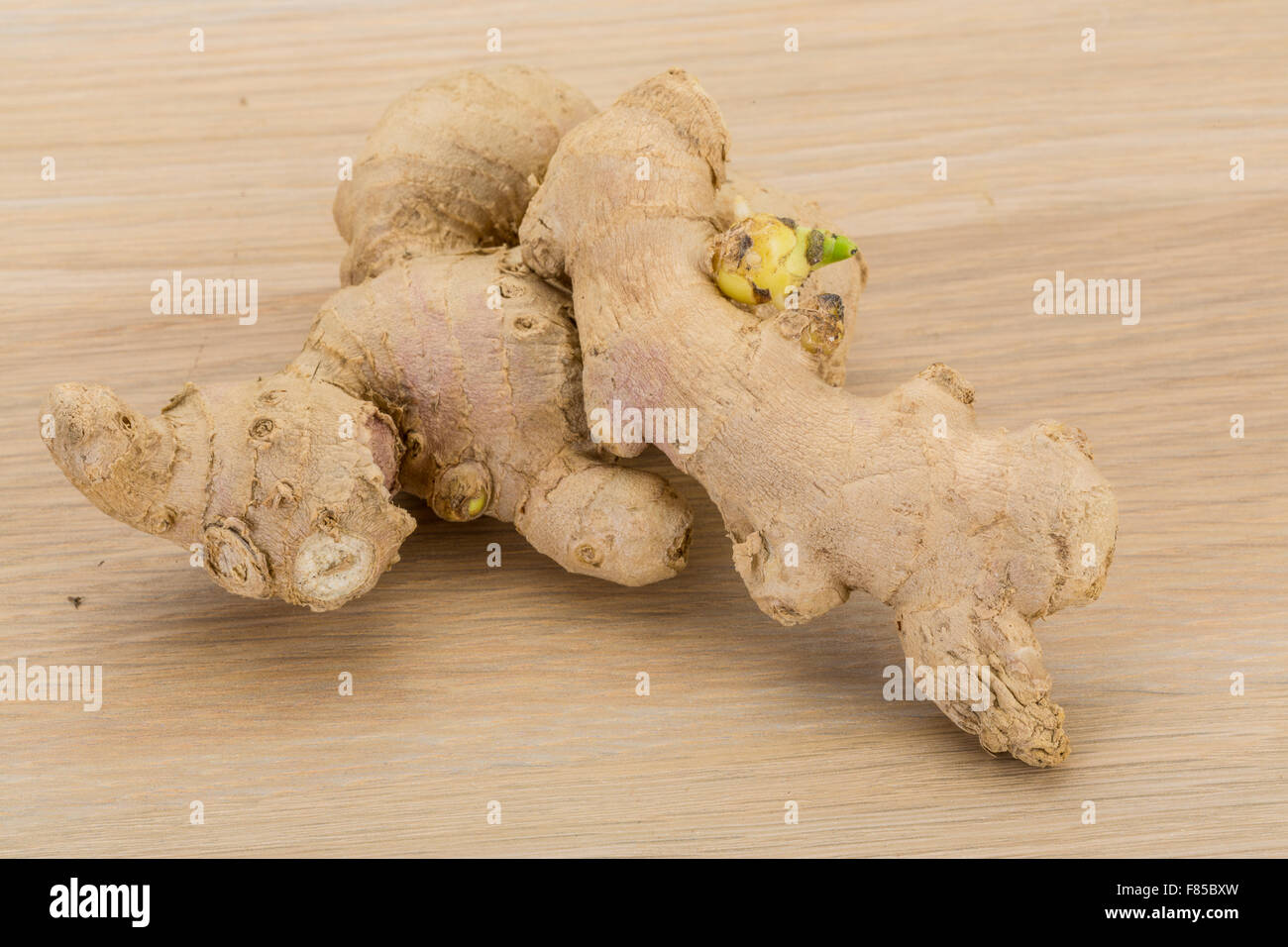 Ginger root on the board - asian food Stock Photo - Alamy