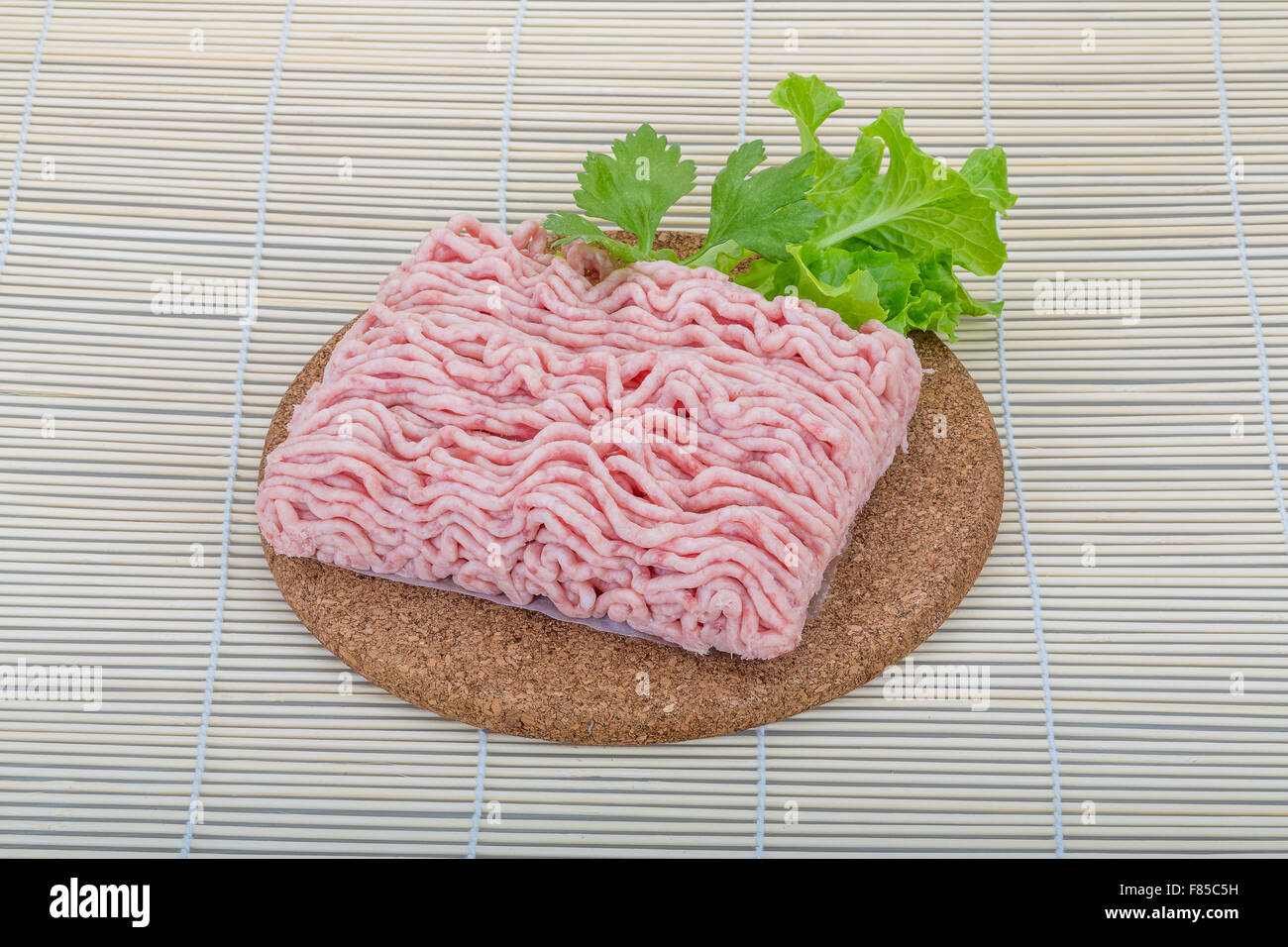 Raw minced pork meat on the desk with herbs Stock Photo - Alamy