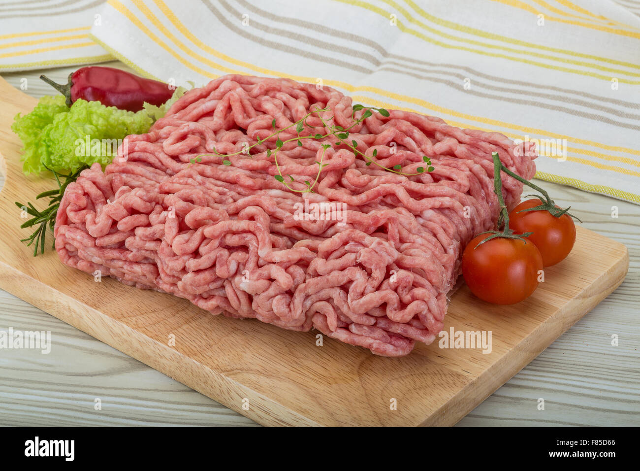 Minced meat - ready for cooking with herbs Stock Photo - Alamy