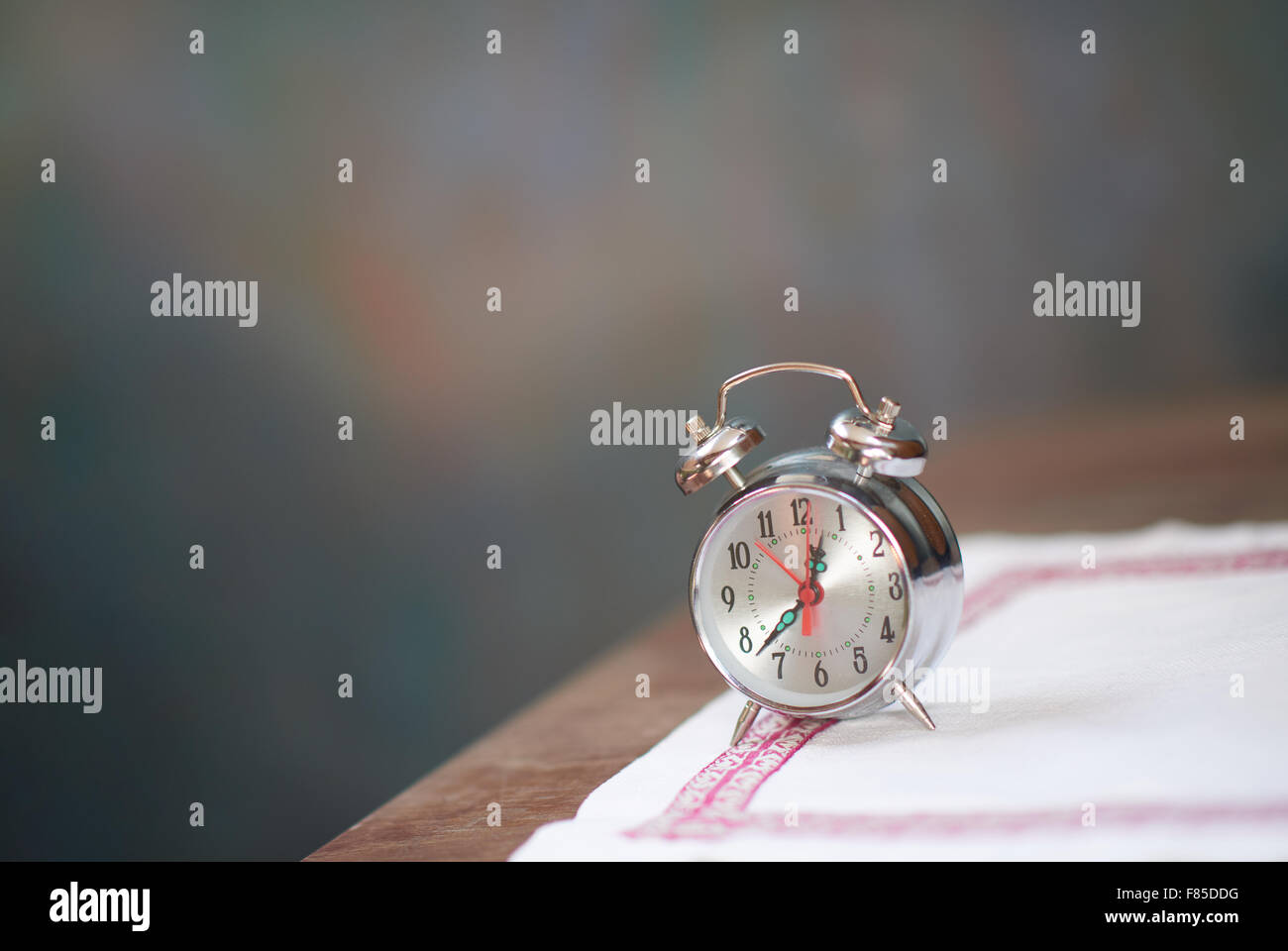 vintage retro old clock at wooden table Stock Photo - Alamy