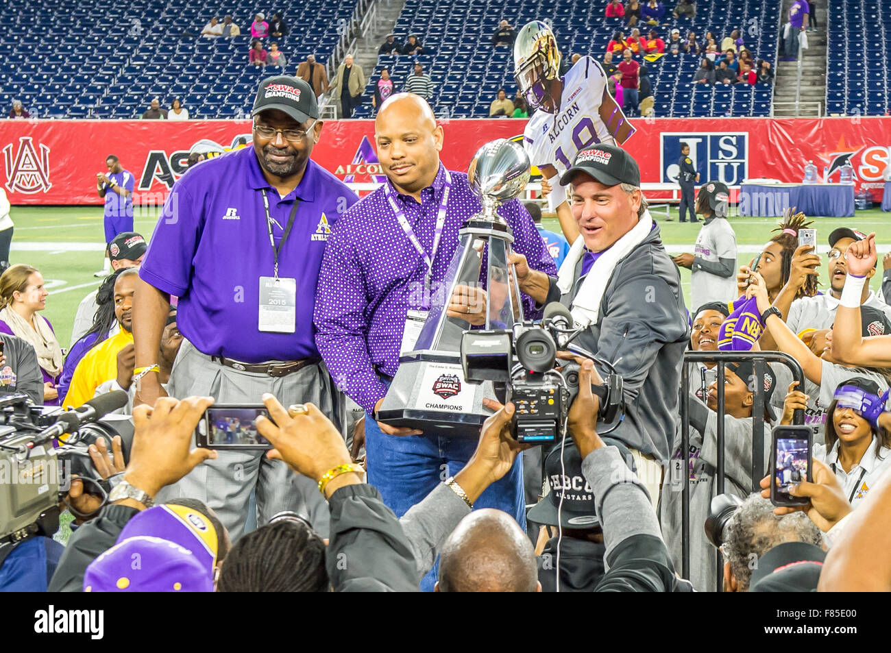 December 5, 2015 - Alcorn head coach Jay Hodson (r) displays the SWAC ...
