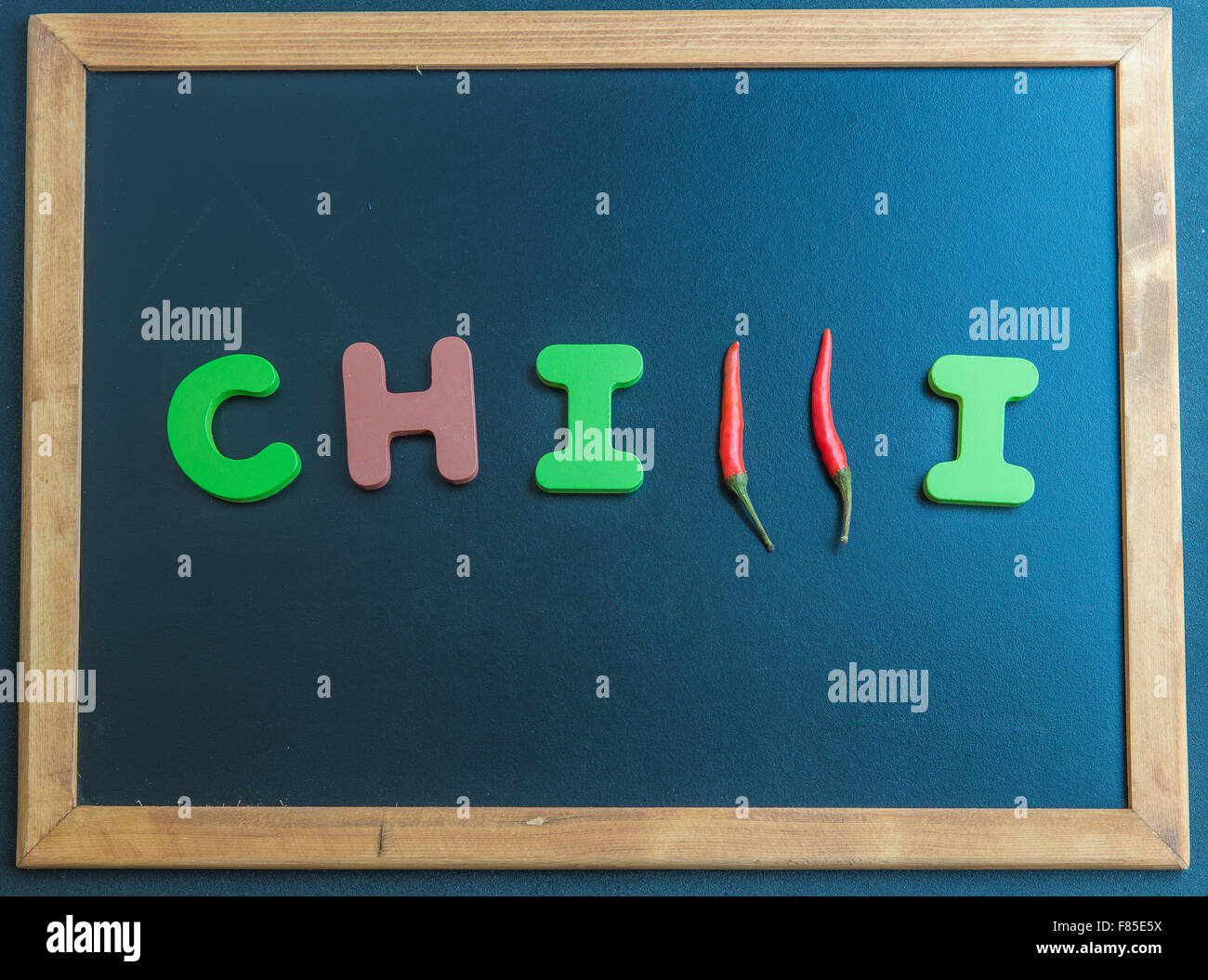 Chilli wooden word on hi-res stock photography and images - Alamy