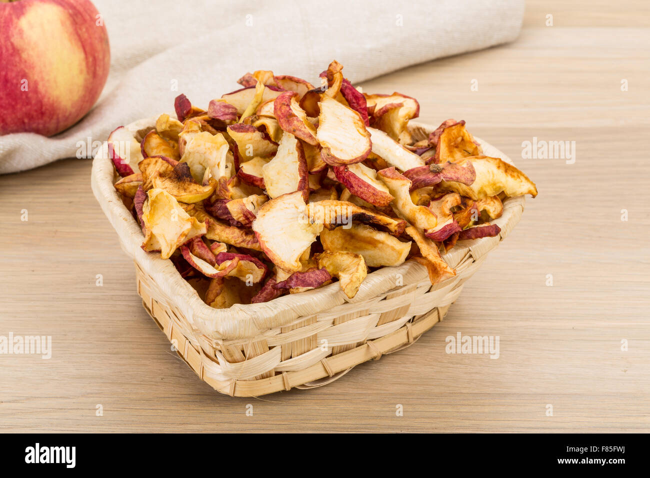 Apple chips in the bowl - diet snack Stock Photo - Alamy