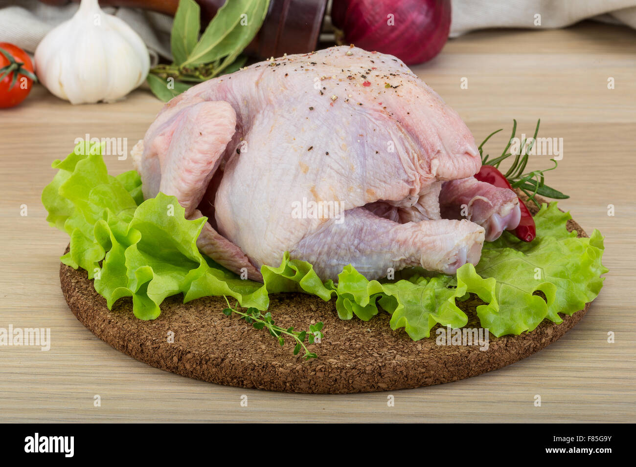 Raw Quail with herbs ready for cooking Stock Photo - Alamy
