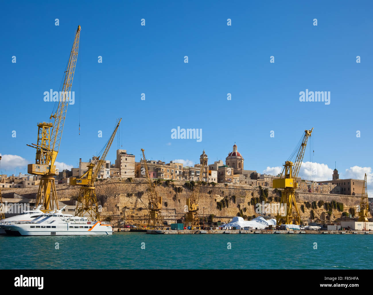 Cranes in dry docks at Grand harbour (Malta Stock Photo - Alamy