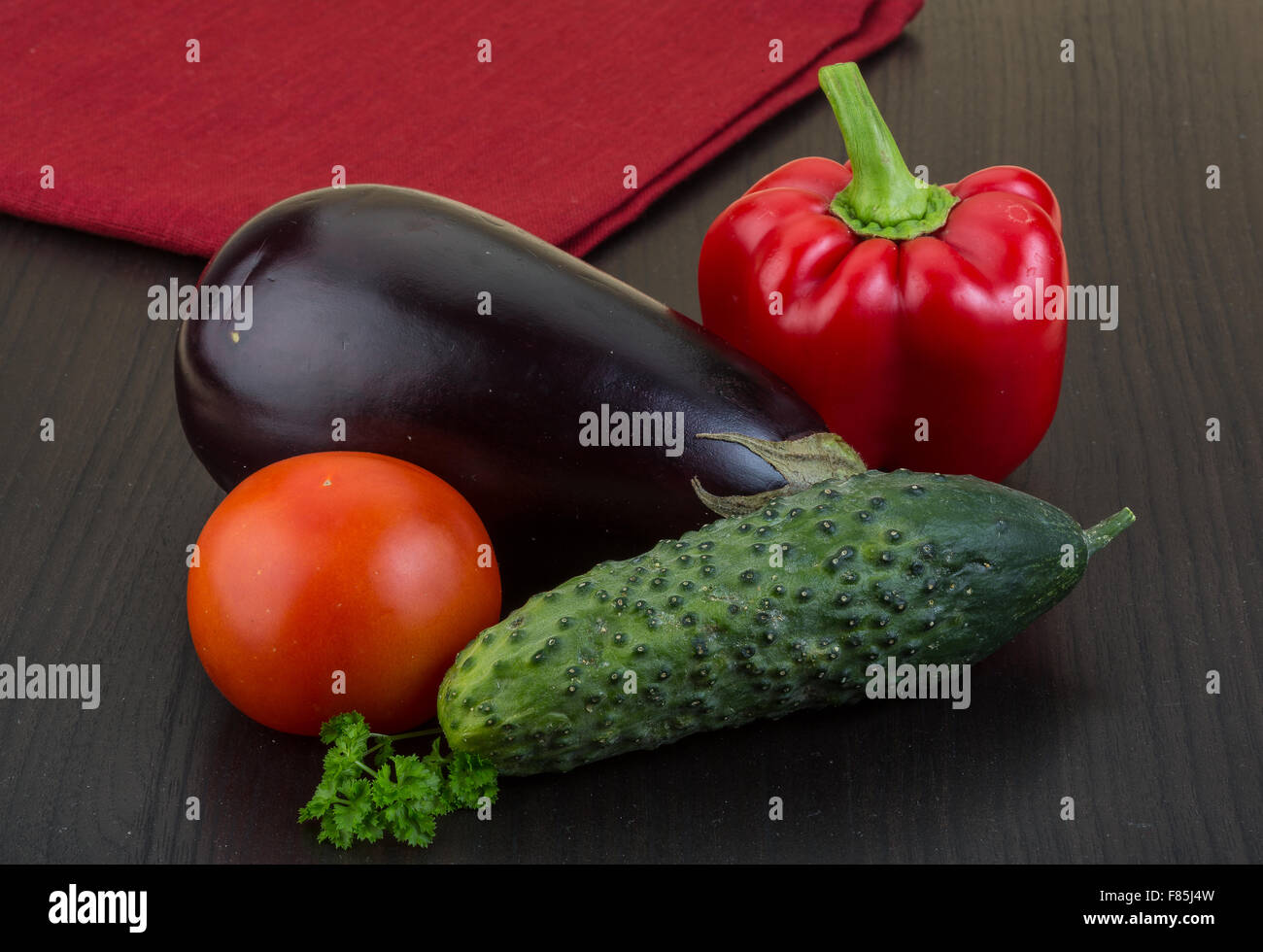 Vegetable assortment: tomato, cucumber, pepper, aubergine Stock Photo ...