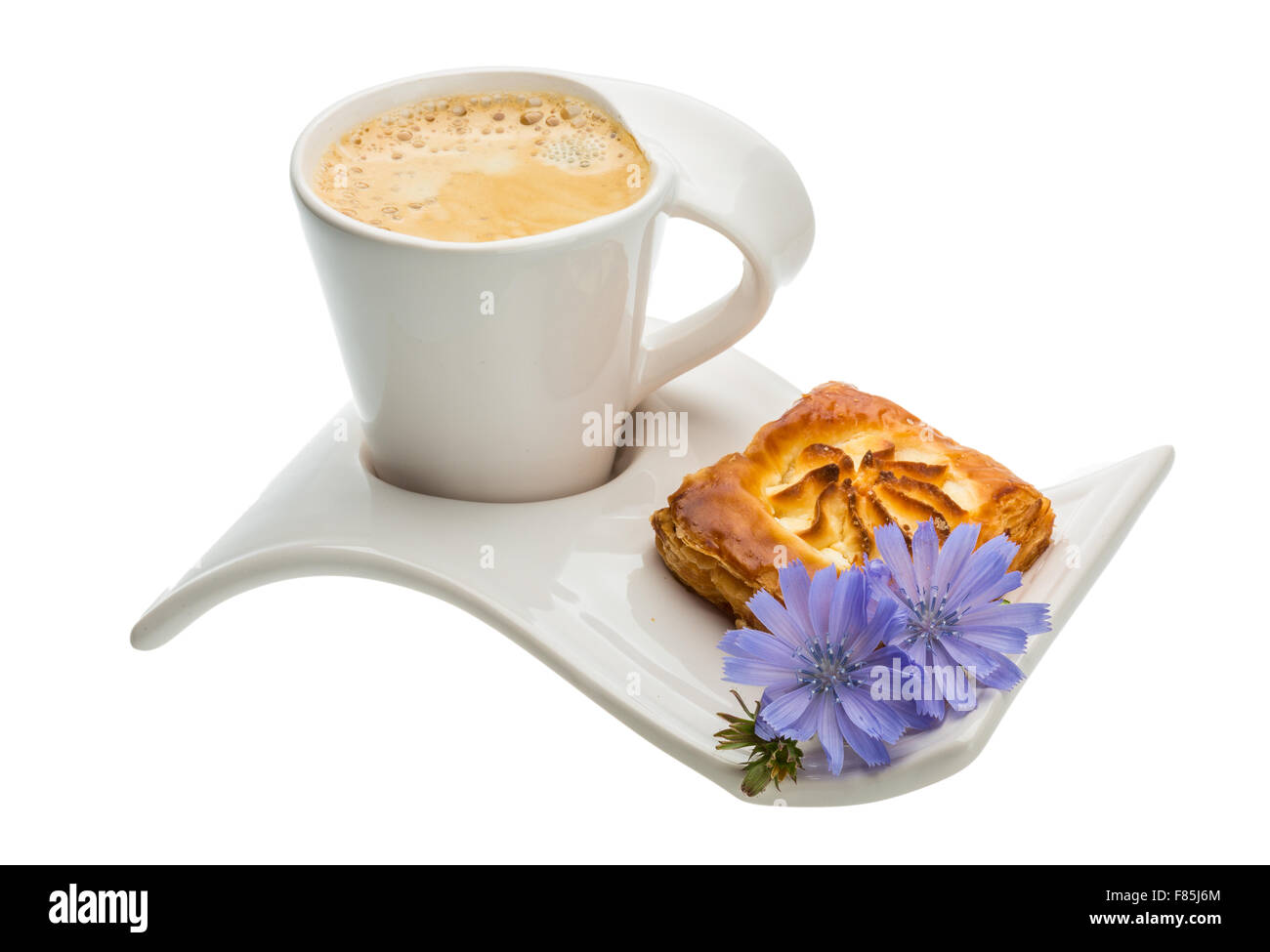 Coffee with pastry and blue flower Stock Photo - Alamy