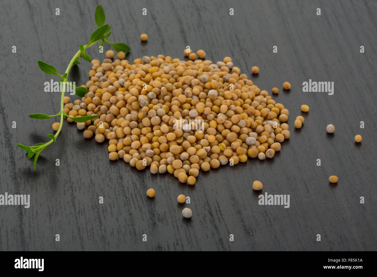 Mustard seeds on the desk Stock Photo - Alamy