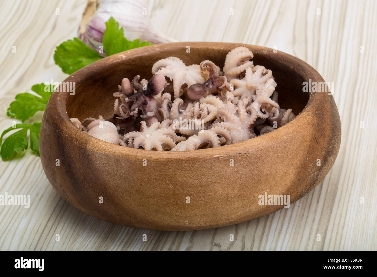 Boiled octopus - mini seafood in the bowl Stock Photo - Alamy