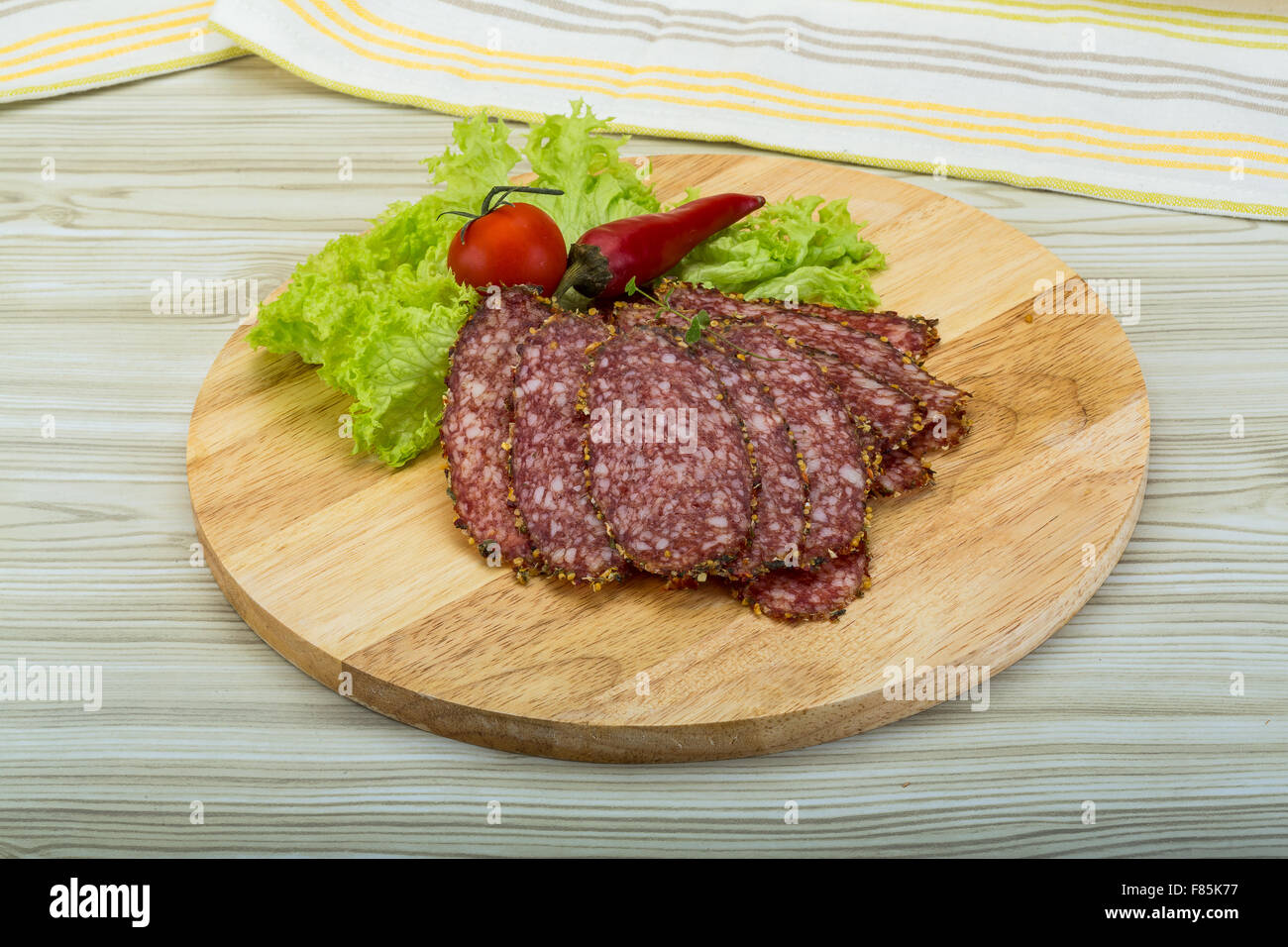 Sliced salami - with herbs and spices Stock Photo - Alamy