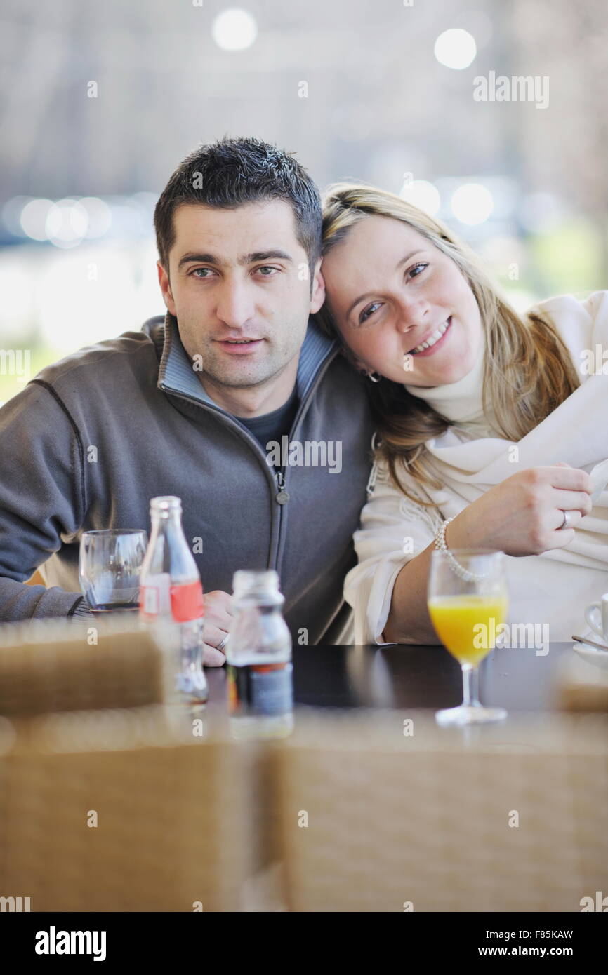 young happy couple have fun on coffee break at bright morning Stock ...