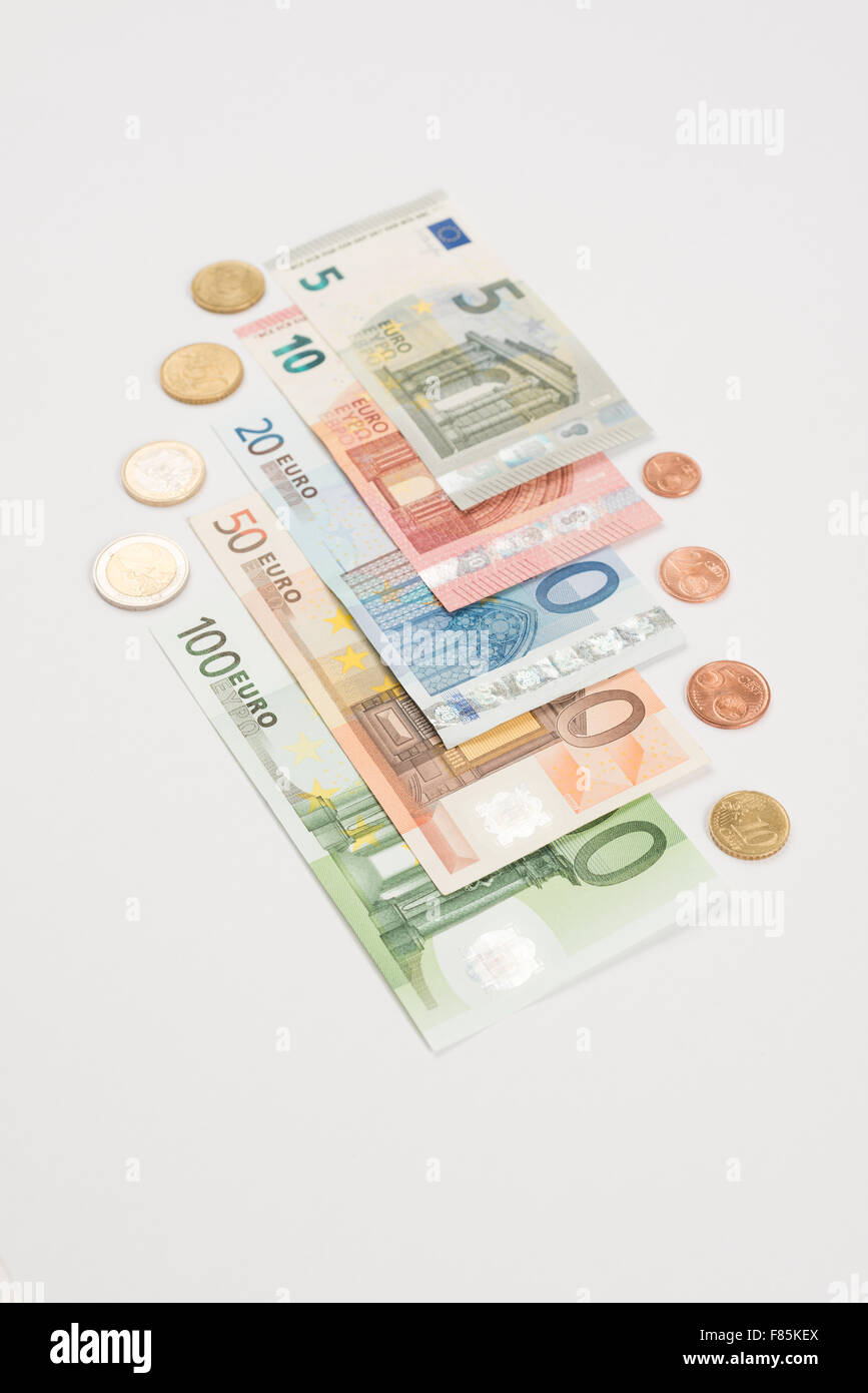 Various euro bills and coins with different value Stock Photo - Alamy