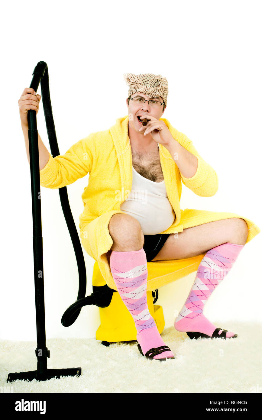crazy carpet cleaner vacuuming with vacuum cleaner in the yellow robe ...