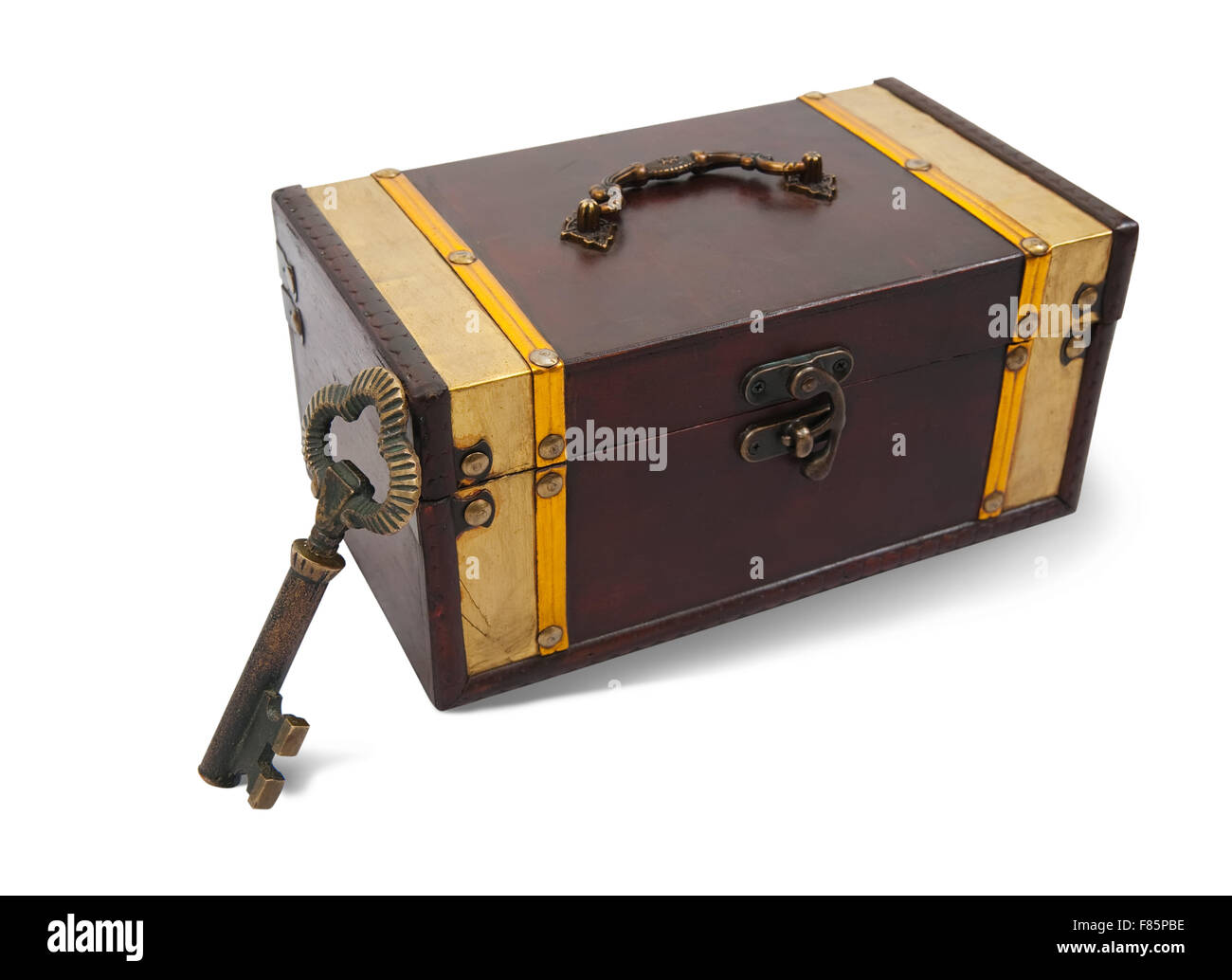 Vintage key and treasure chest on a white background with clipping path ...