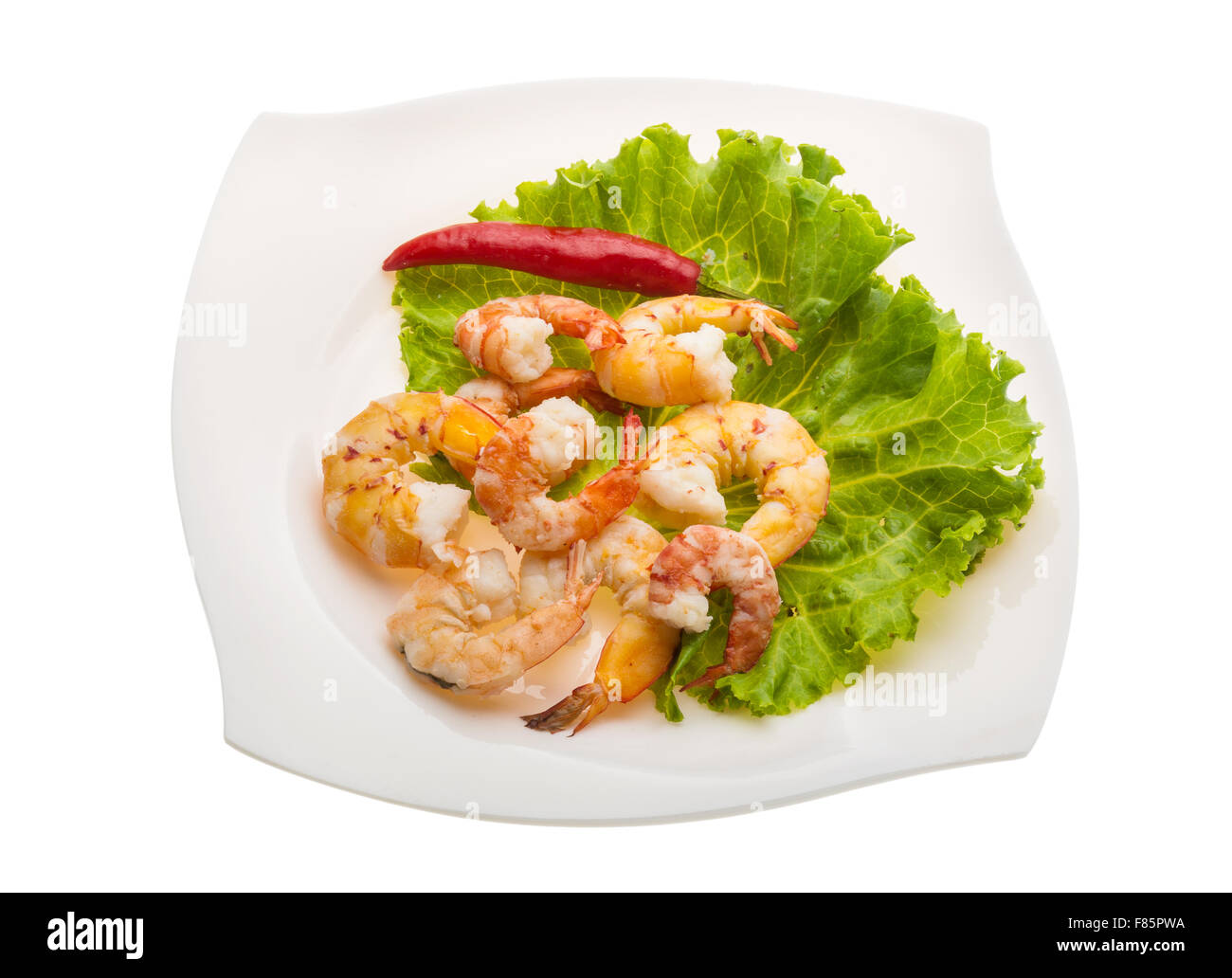 Unshelled king prawn heap with salad leaves Stock Photo - Alamy