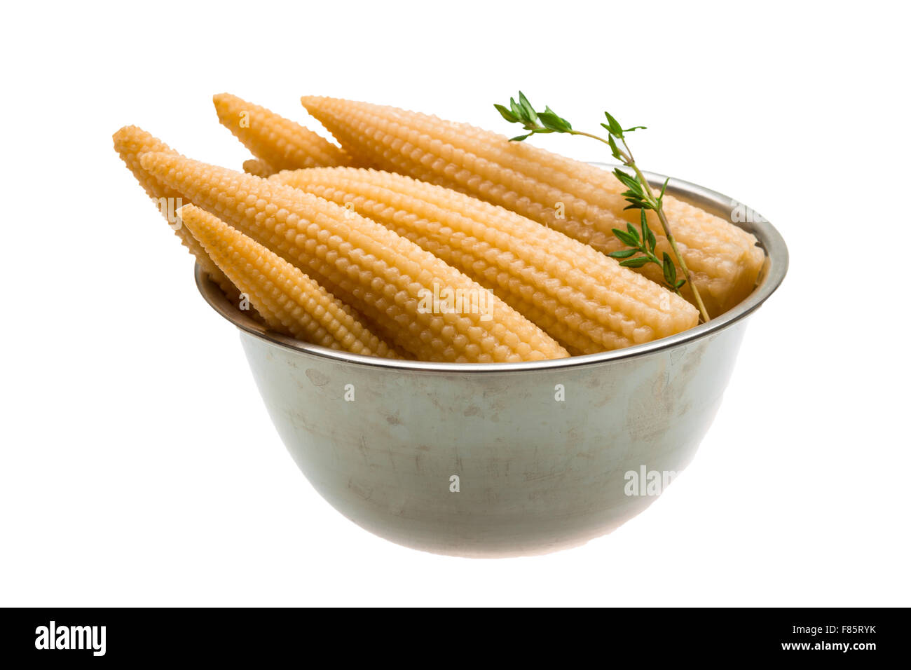 Baby corn with thyme Stock Photo - Alamy
