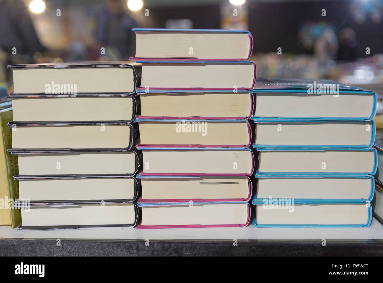 Pile of books in a book shop Stock Photo - Alamy