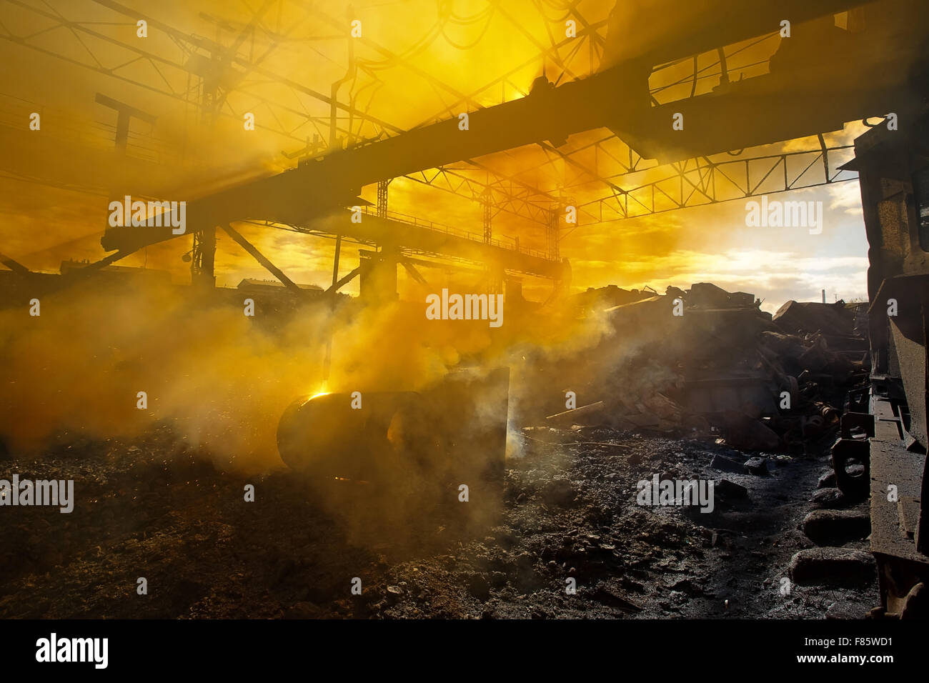 Scrap metal and smoke Stock Photo - Alamy