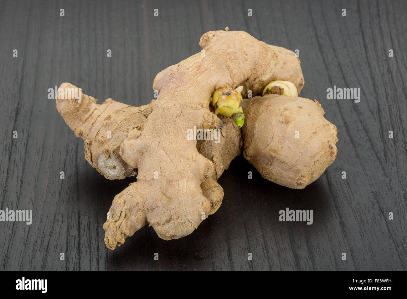 Ginger root on the board - asian food Stock Photo - Alamy