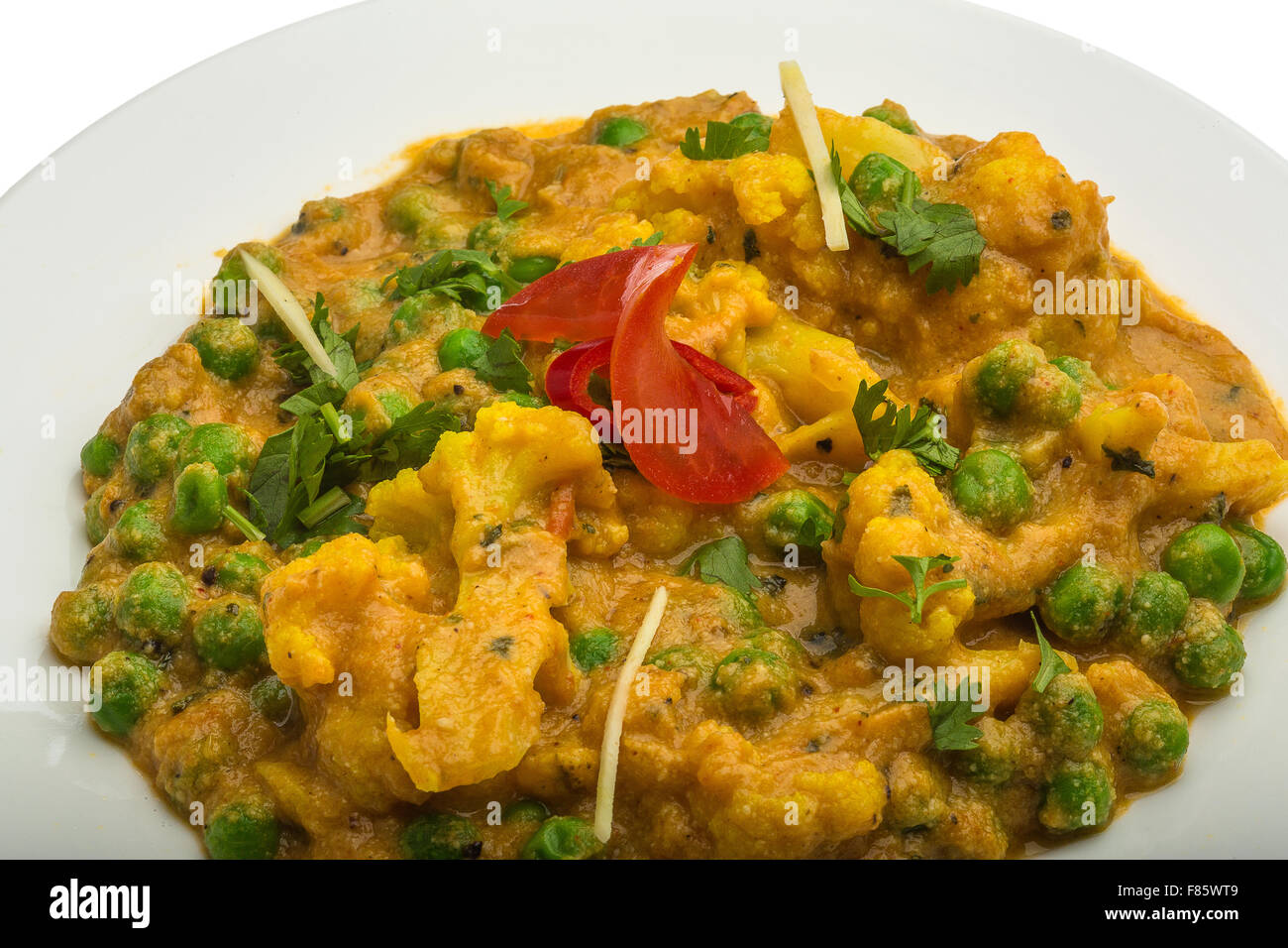 Gobi Mutter Kaju - cauliflower with green peas and cashew Stock Photo ...