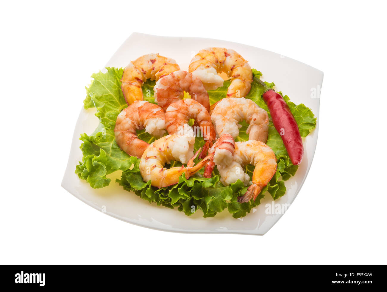 Unshelled king prawn heap with salad leaves Stock Photo - Alamy