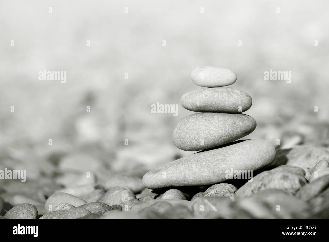 Stack of gray pebble stones close up Stock Photo - Alamy