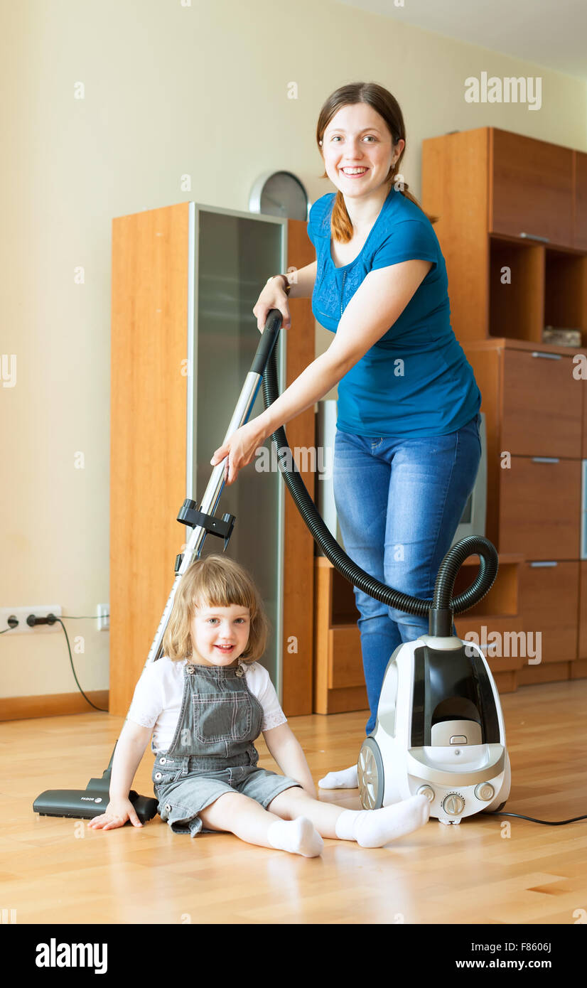 Woman daughter doing household chores hi-res stock photography and images - Alamy
