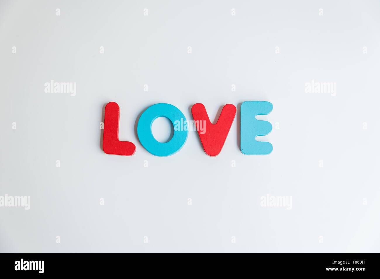Wooden word LOVE on White background Stock Photo - Alamy