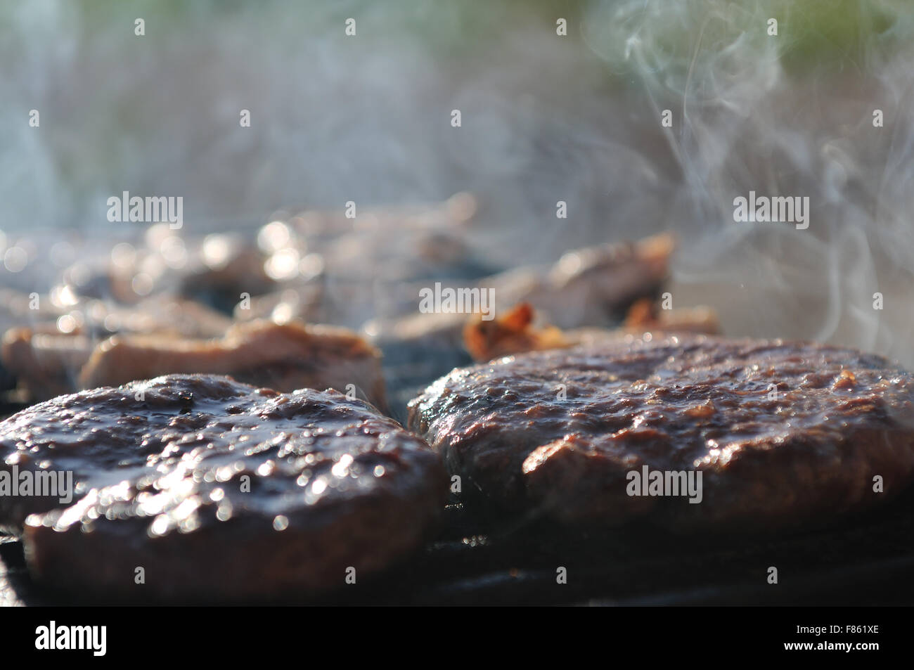 fresh food steak grill meat on fire outdoor Stock Photo - Alamy