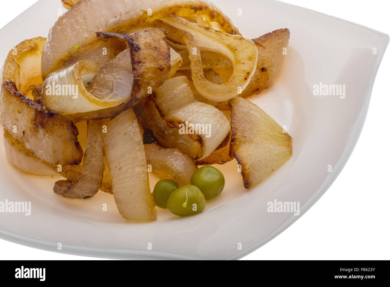 Fried gold onion snack isolated Stock Photo - Alamy