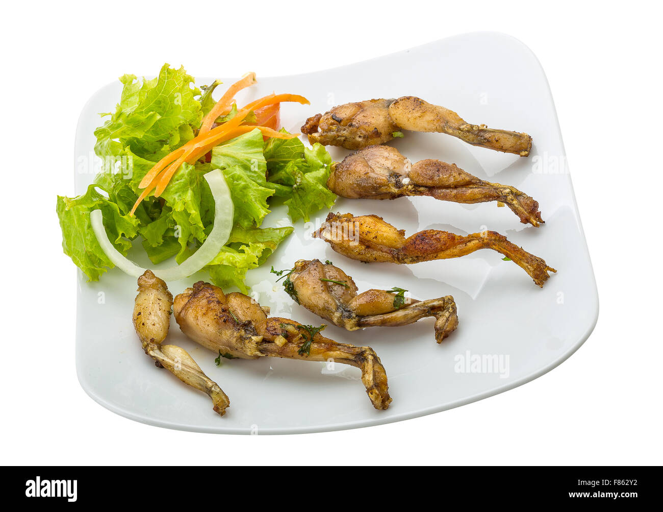 Grilled frog legs - French style Stock Photo - Alamy