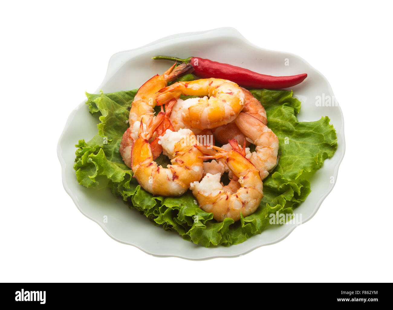 Unshelled king prawn heap with salad leaves Stock Photo - Alamy