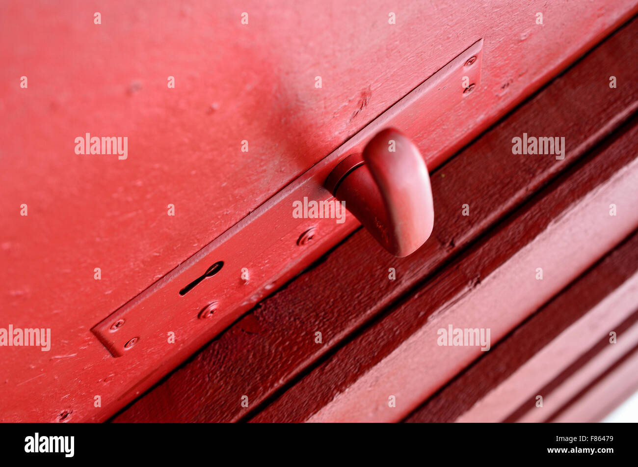 red door with red door handle Stock Photo - Alamy