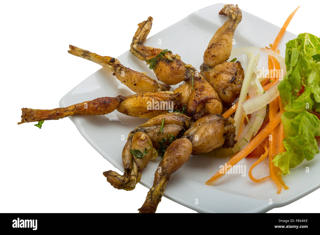 Grilled frog legs - French style Stock Photo - Alamy