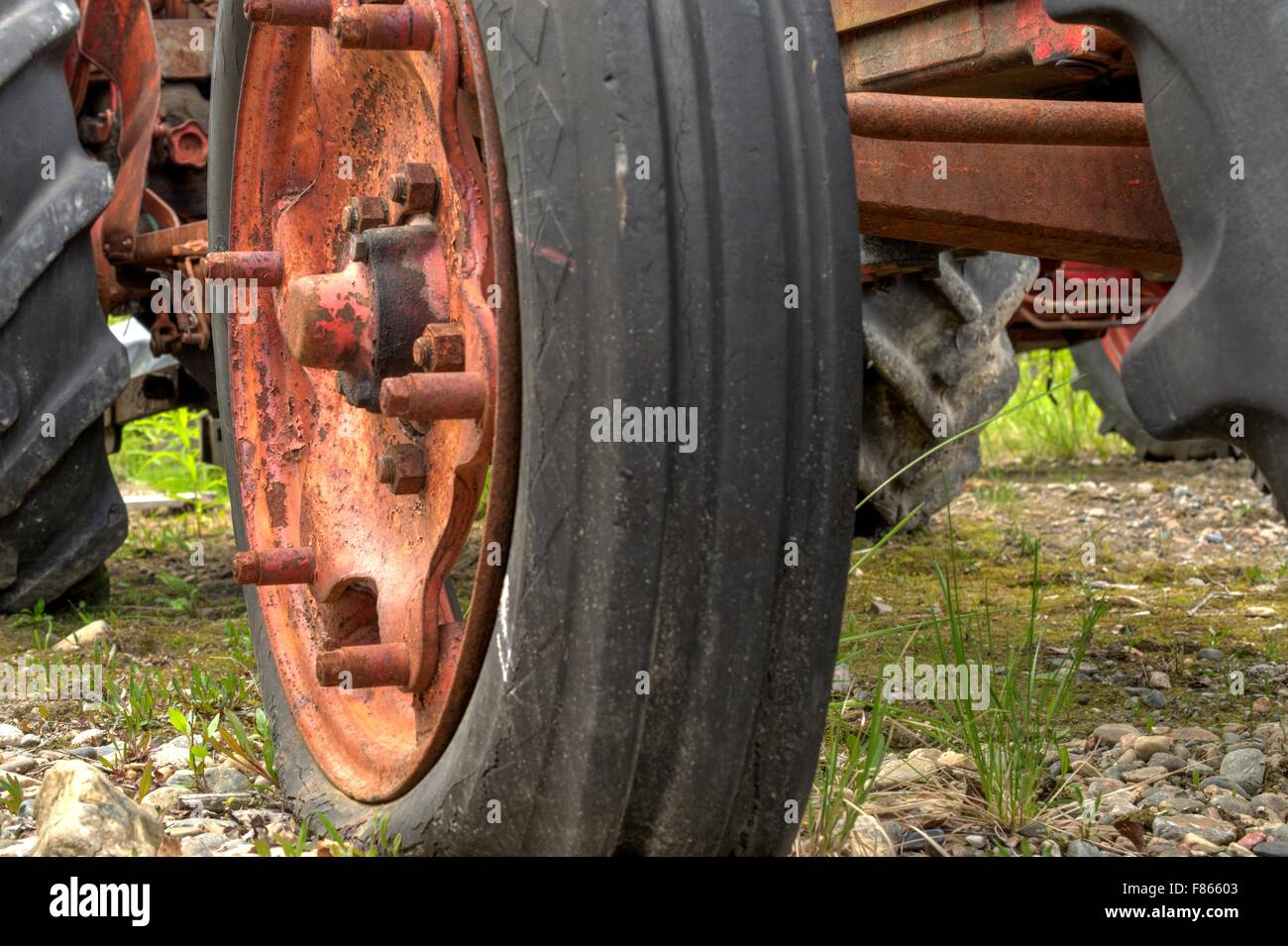 old red rusted tractor wheel Stock Photo - Alamy