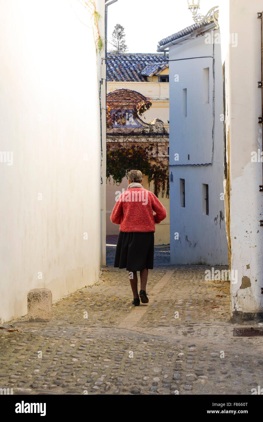 Older woman walking street hi-res stock photography and images - Alamy