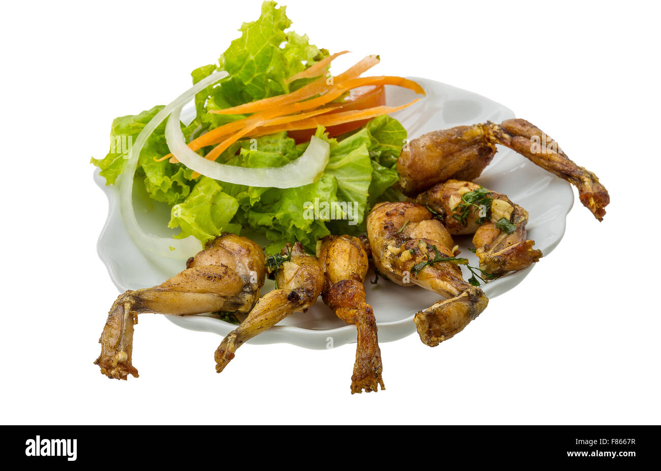 Grilled frog legs - French style Stock Photo - Alamy