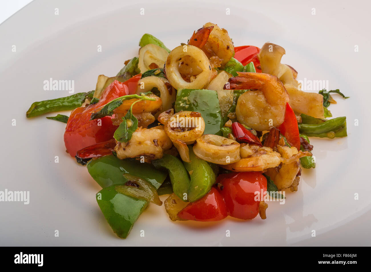 Seafood with vegetables - shrimps and calamari Stock Photo - Alamy