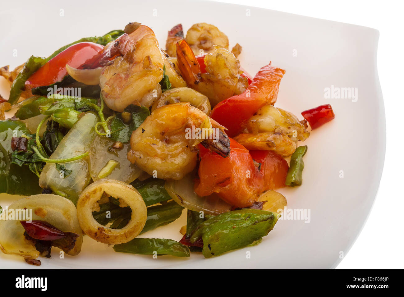 Seafood with vegetables - shrimps and calamari Stock Photo - Alamy