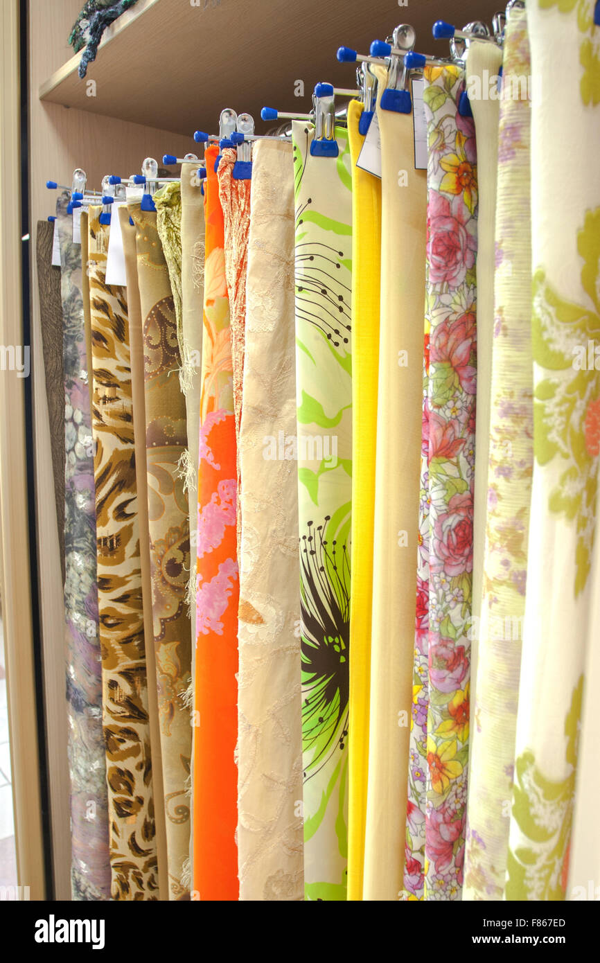 Stack of colourful folded fabric Stock Photo - Alamy